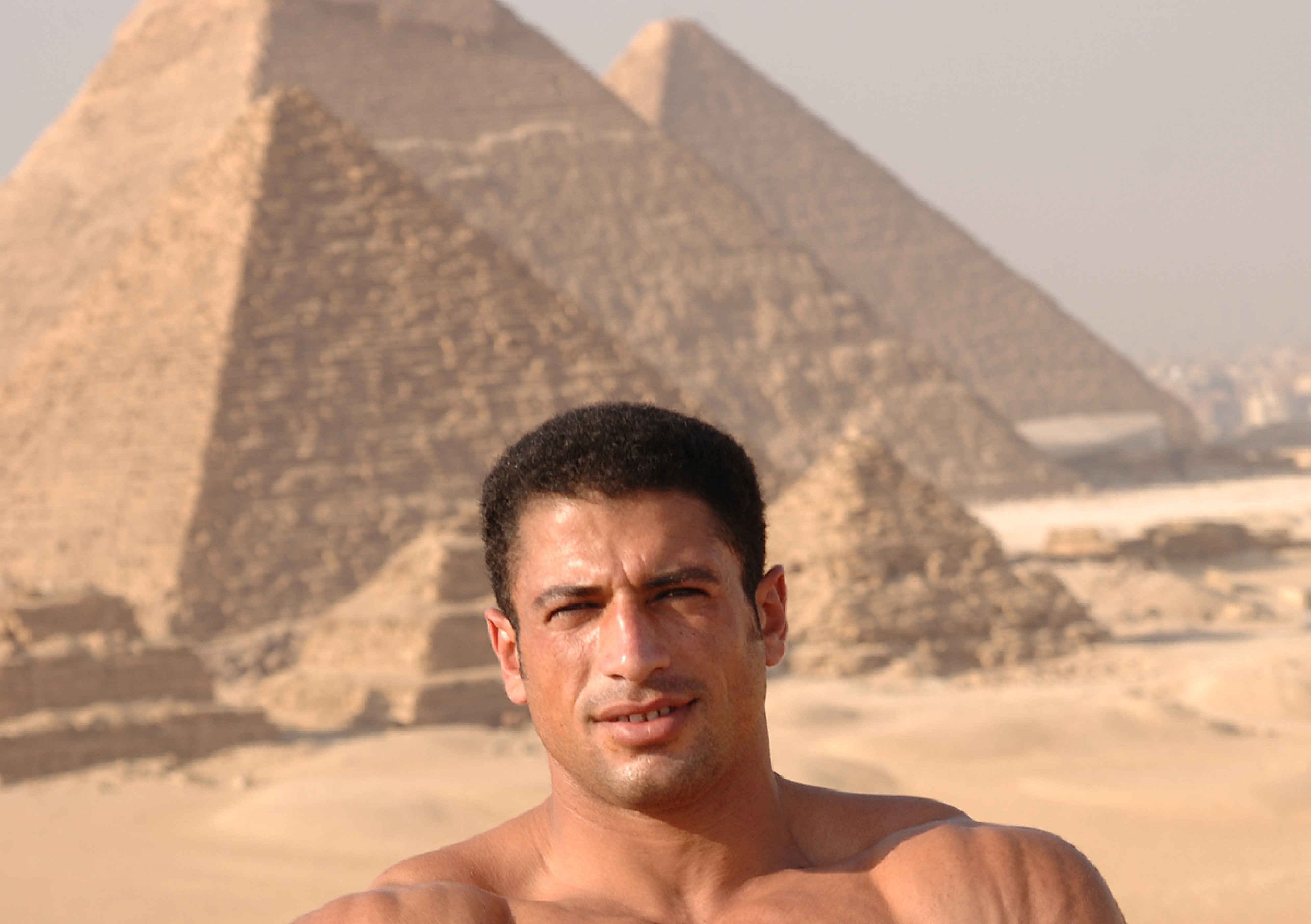 Mustafa Nessem at the Giza Pyramids - Male Bodybuilders and Muscle Videos at MuscleGallery.com